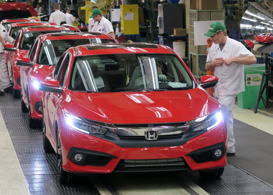Honda of Canada Mfg. associates perform final inspections on an all-new ...